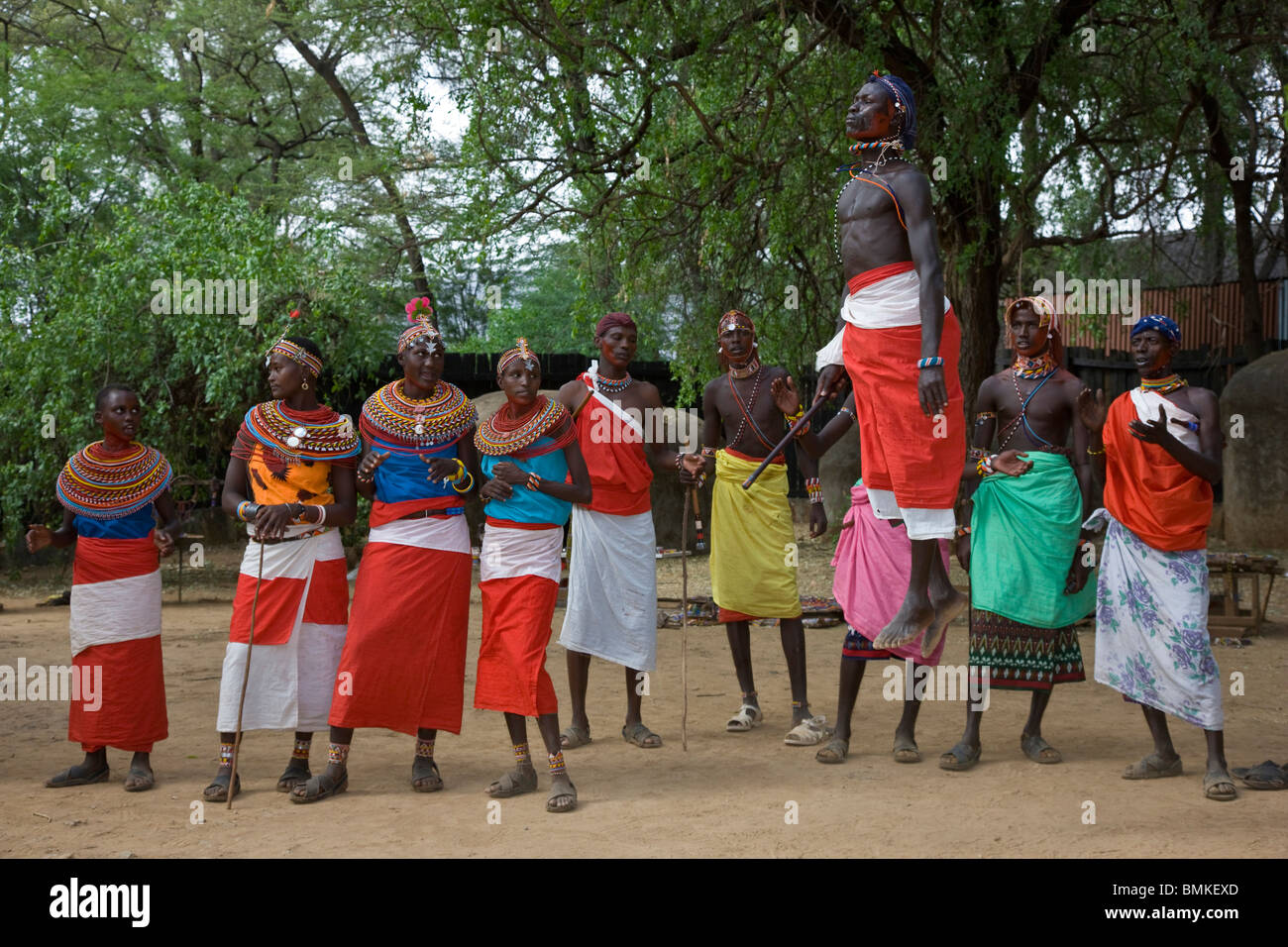 Africa. Kenya. Young Samburu morani dance with women in colorful ...