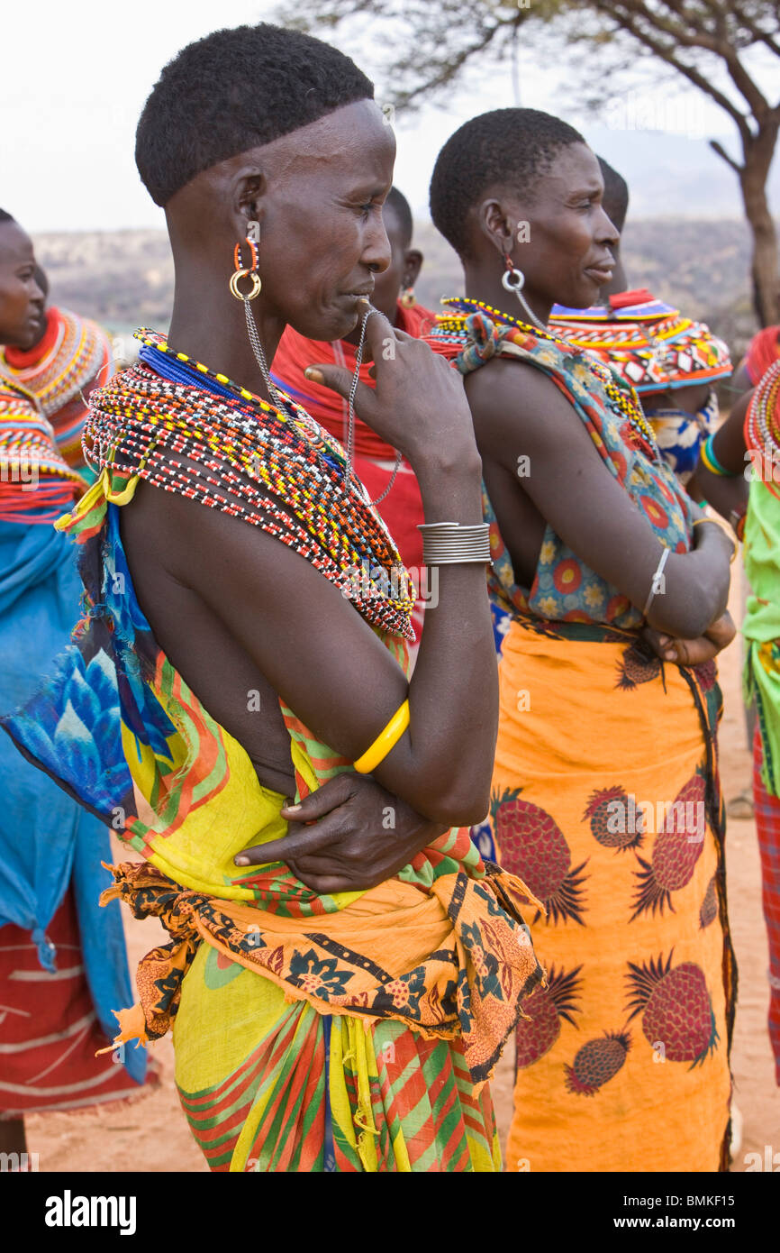 Africa. Kenya. Young Samburu women in colorful, traditional dress at a ...