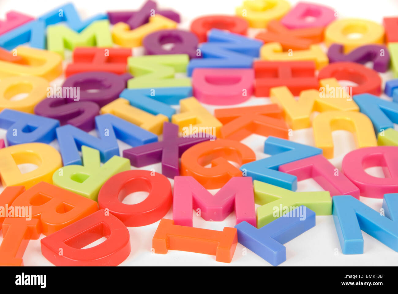 Brightly Colored Childrens Toy Magnetic Alphabet Letters on White ...