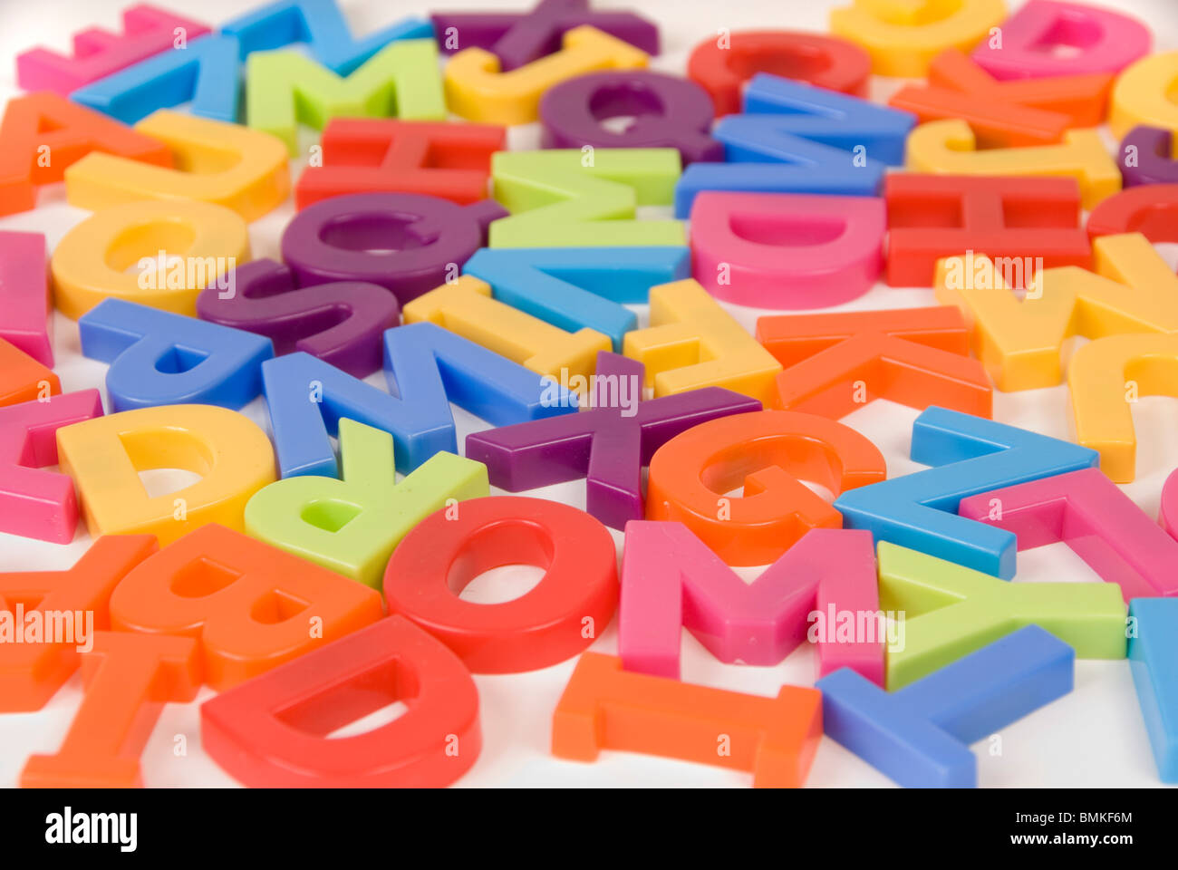 Brightly Colored Childrens Toy Magnetic Alphabet Letters on White ...