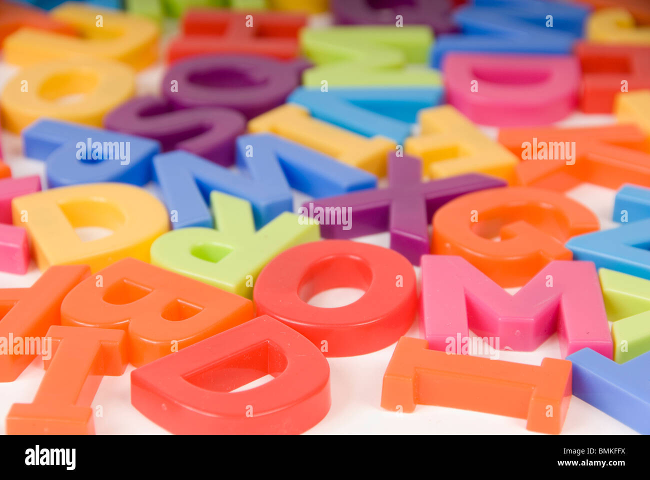 Brightly Colored Childrens Toy Magnetic Alphabet Letters on White ...