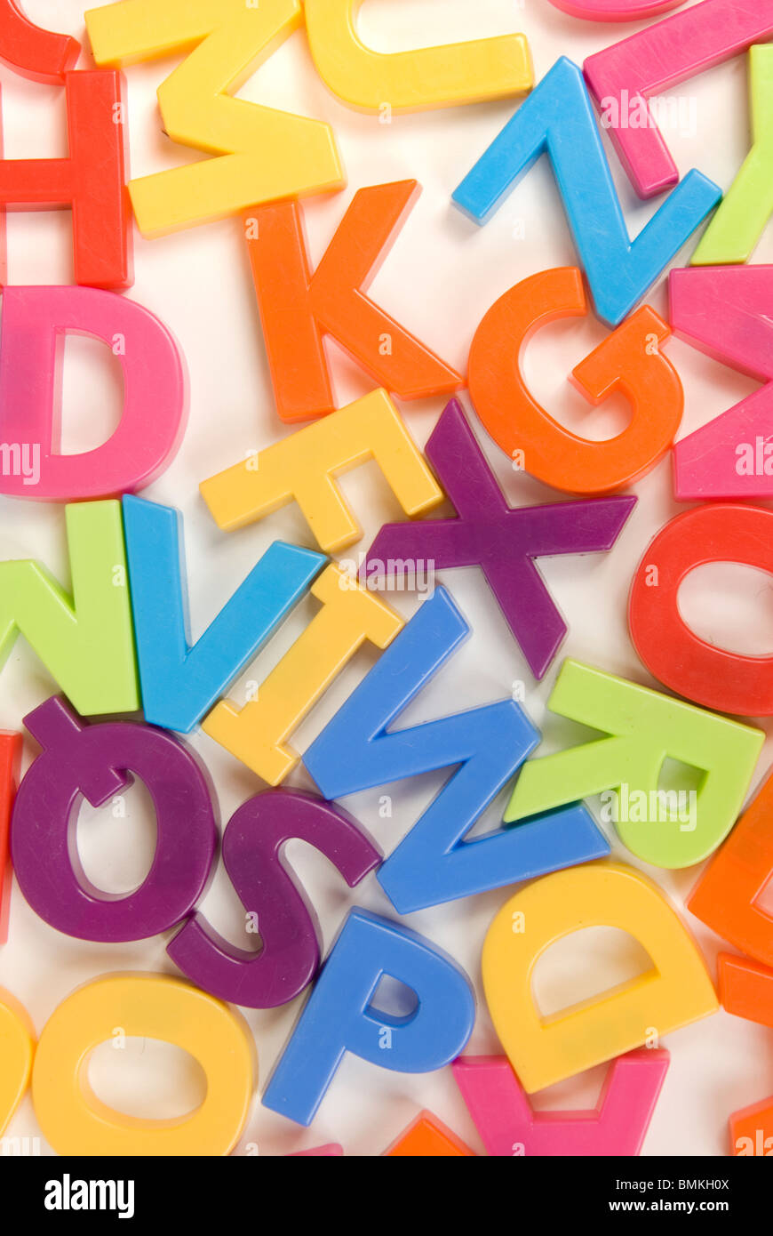 Brightly Colored Childrens Toy Magnetic Alphabet Letters on White ...