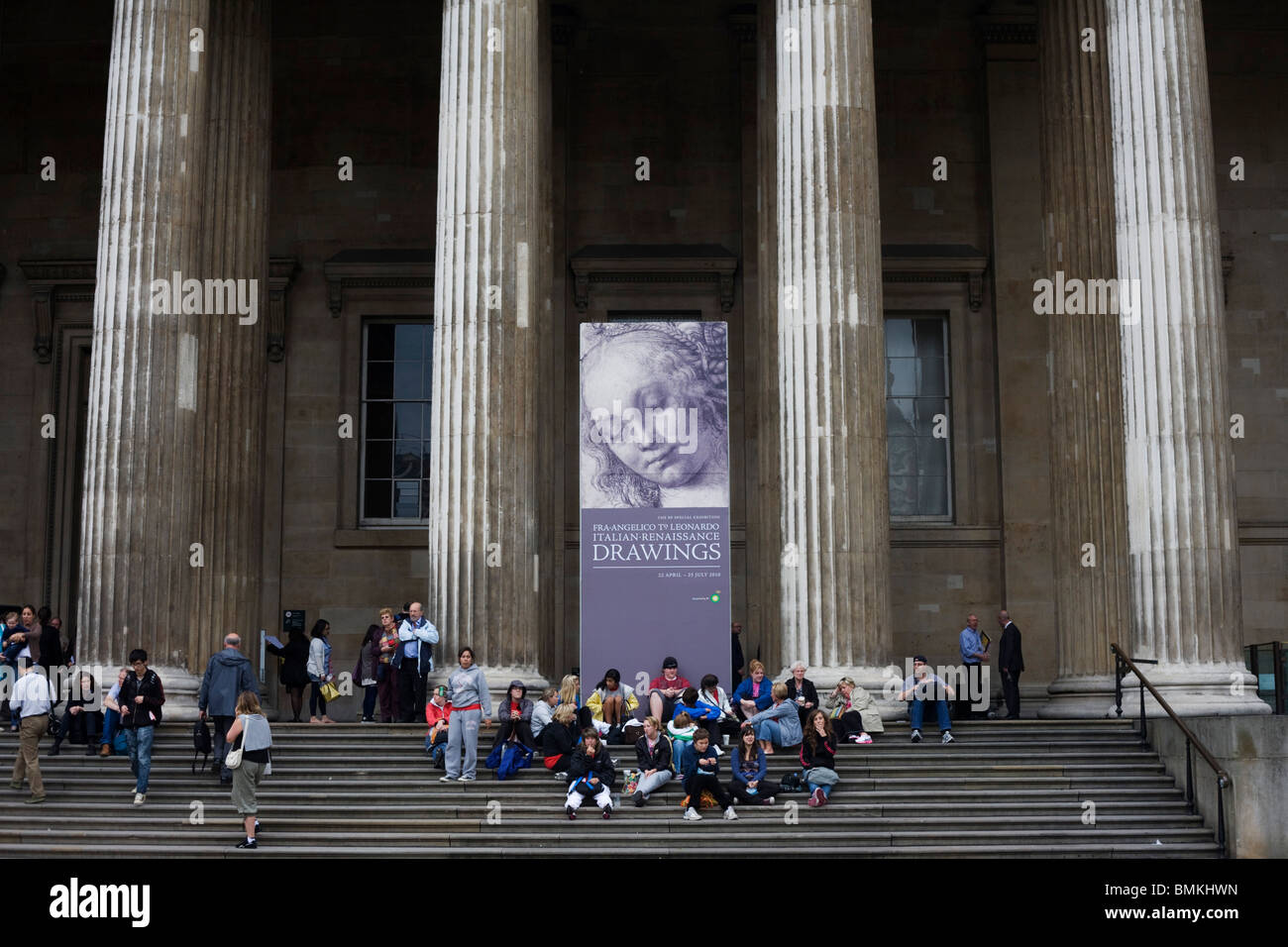 Visitors beneath the columns of London's British Museum Stock Photo - Alamy