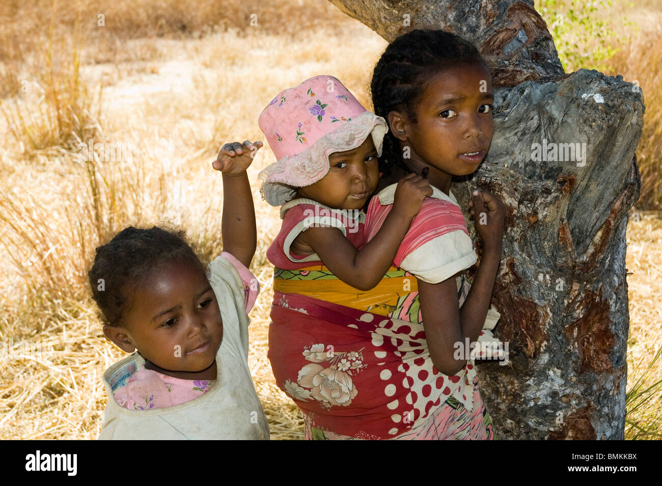 Madagascar, Ranohira. Girl & baby Stock Photo - Alamy