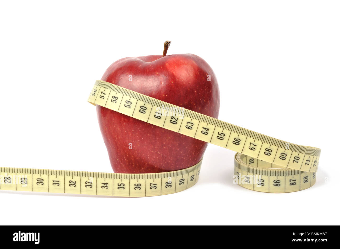 Apple and measuring tape Stock Photo - Alamy