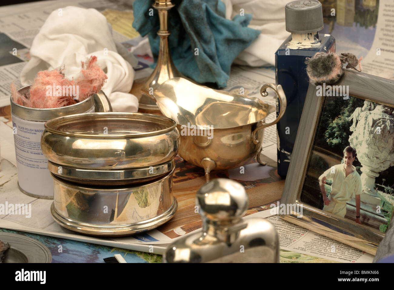 cleaning household family silver that is tarnished Stock Photo - Alamy