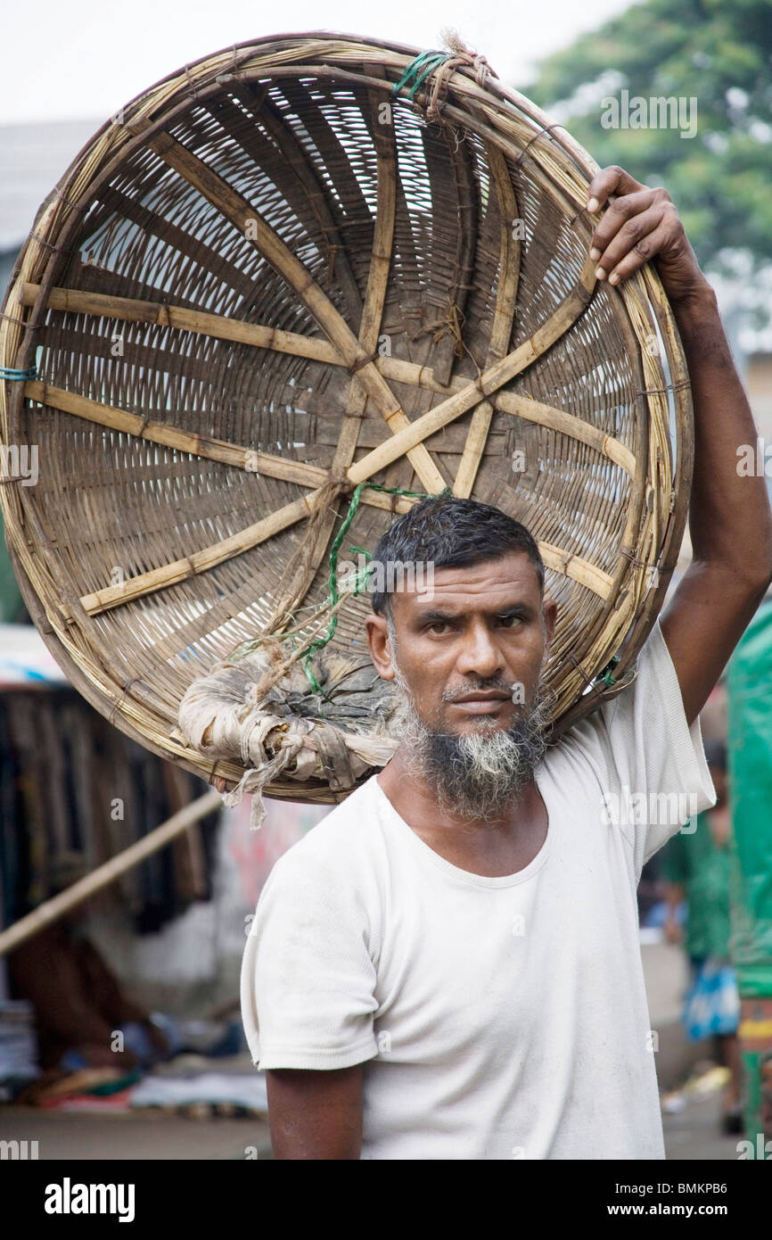 Muslim man with bamboo basket use to carry luggage ; Dhaka ; Bangladesh Stock Photo - Alamy