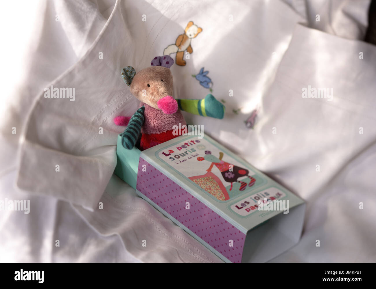 soft toy mouse in a small box Stock Photo - Alamy