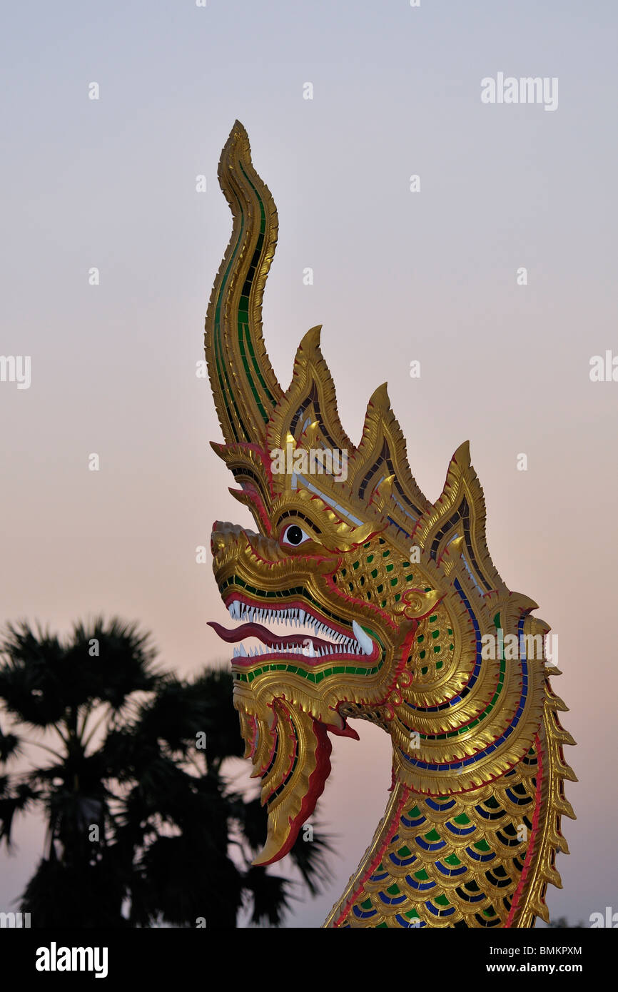 A Naga statue near a Buddhist temple entrance in Thailand Stock Photo ...