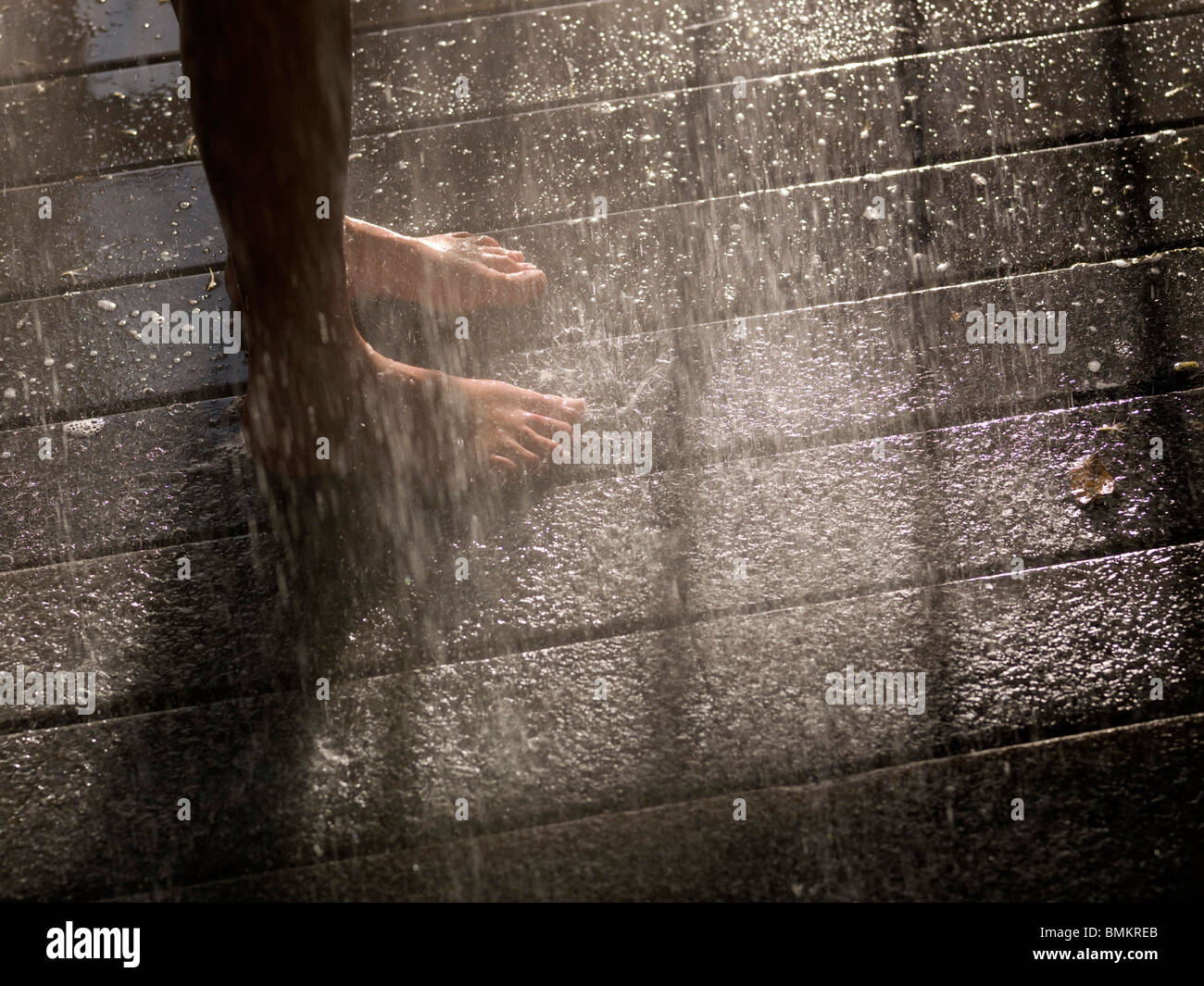 Standing In The Rain Stock Photo - Alamy