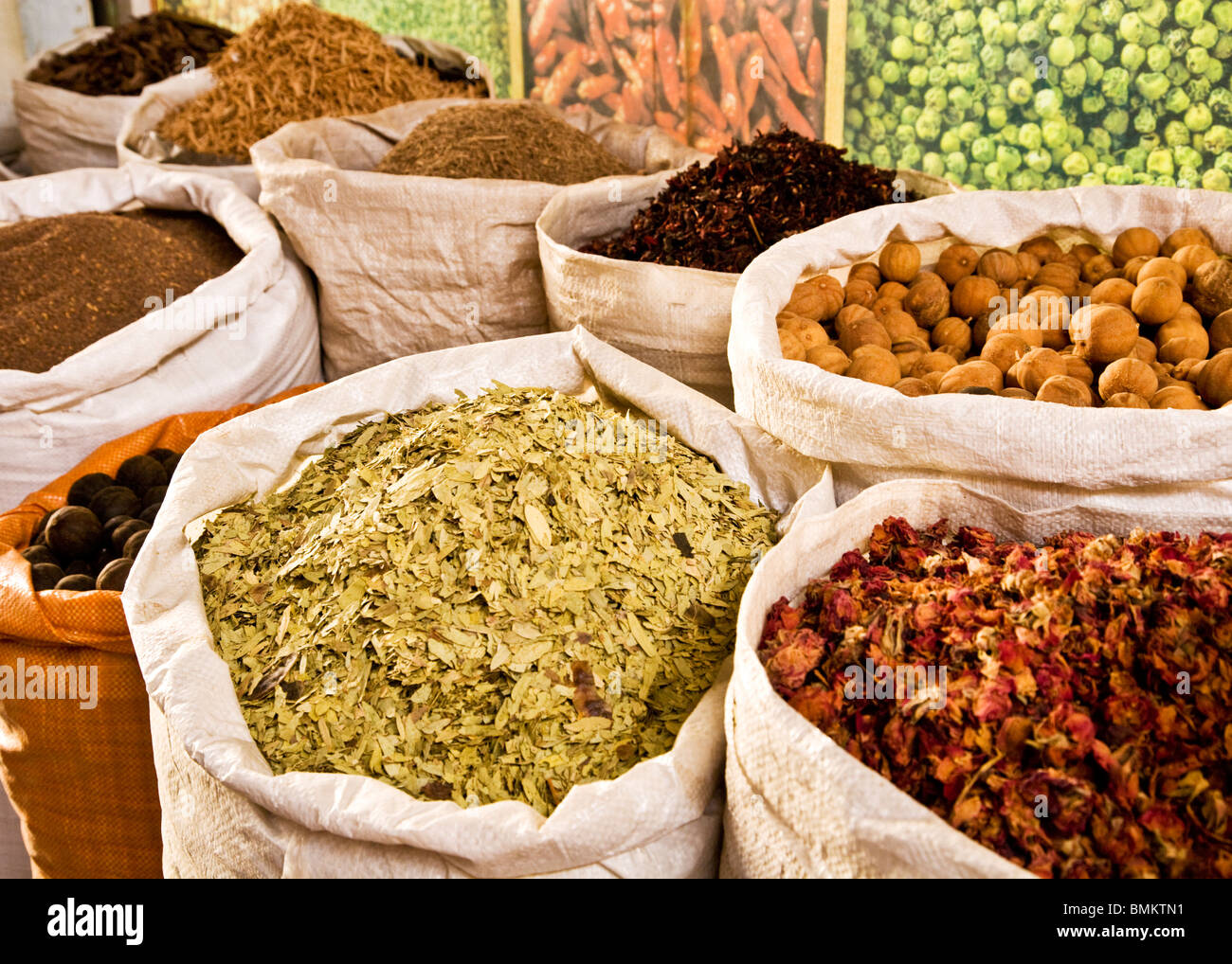 Arabian spices on display in sacks outside a shop in the spice souk in ...