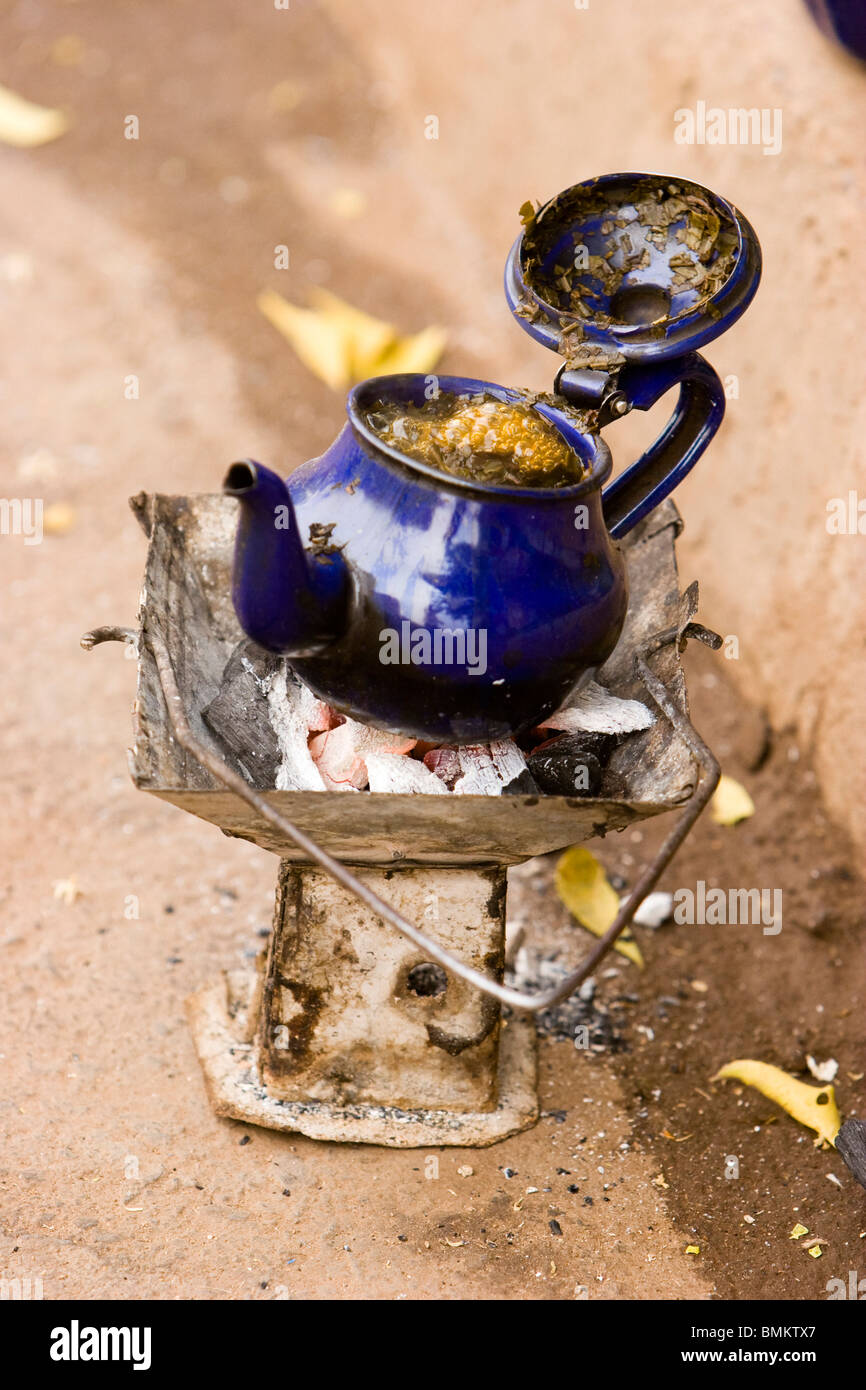 Mali, Bamako. Boiling mint tea Stock Photo - Alamy