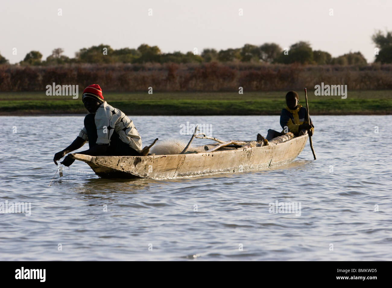Mali, Mopti. People on a boat on the Niger River between Lake Debo ...