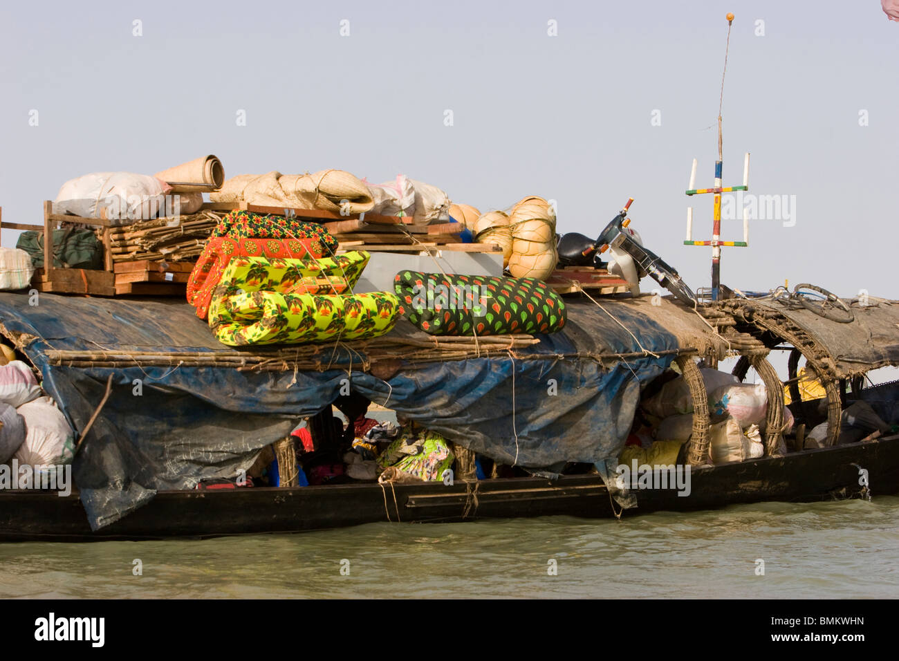 Mali, Mopti. Pinasse carrying cargo and passengers on the Niger River ...