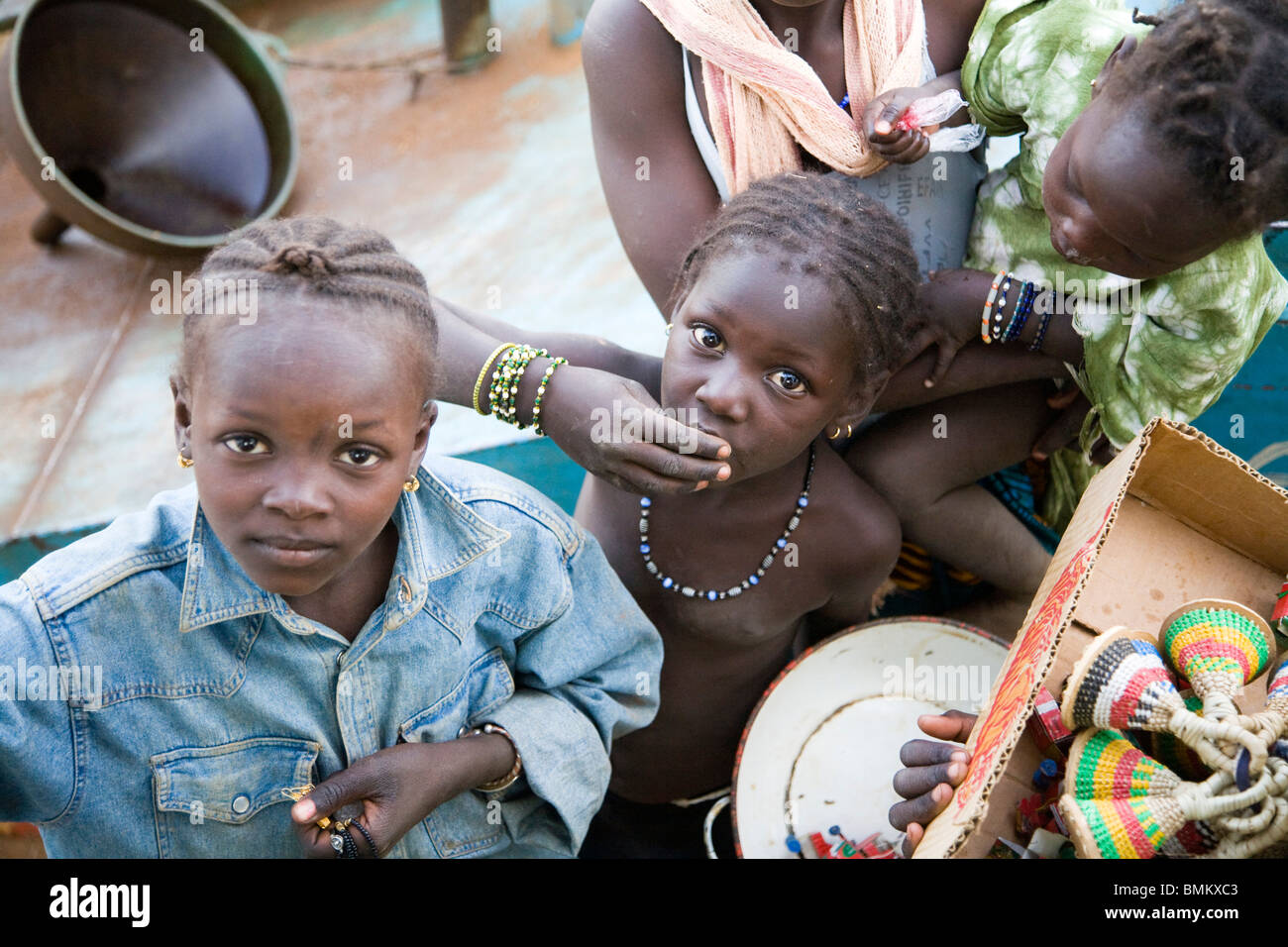 Mali, Djenne. Girls aboard the ferry crossing the Bani River Stock ...