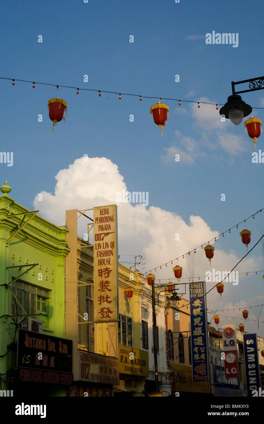 Traditional shops and their mandarin billboards in the old chinese ...