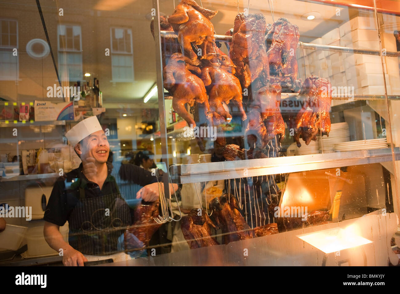 London, UK, Chinatown, Chinese Chef in Chinese Restaurant Window ...