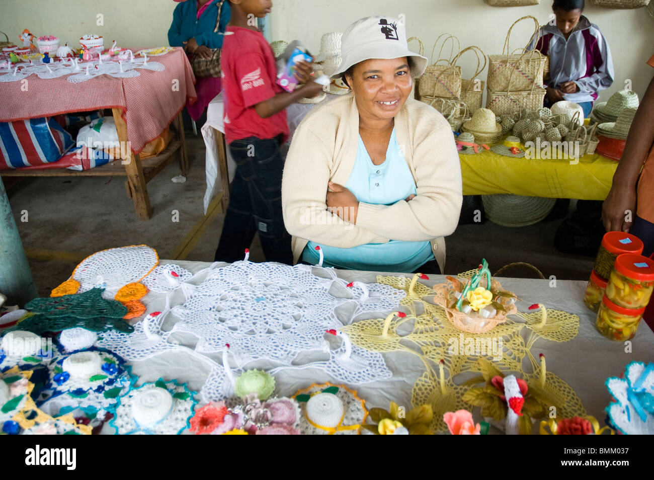 Mauritius, Port Mathurin. Woman selling her knittings at the crafts ...