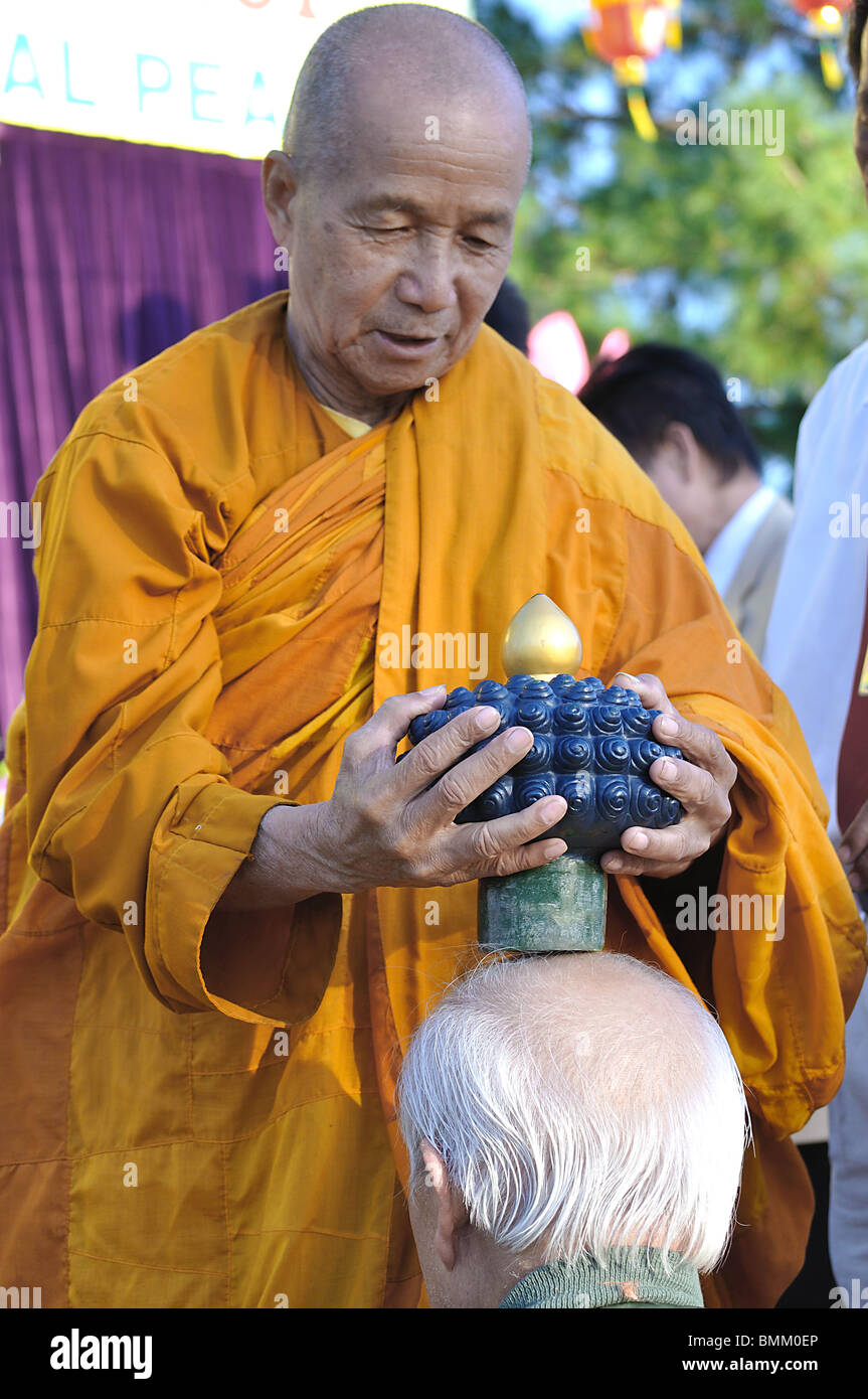 monk blessing man with the jade Buddha crown Stock Photo - Alamy