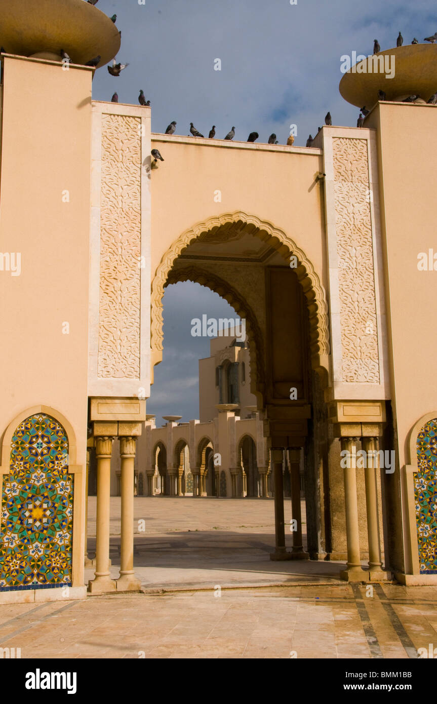 Casablanca Morocco arched entry gate with pigeons Hassan II Mosque ...