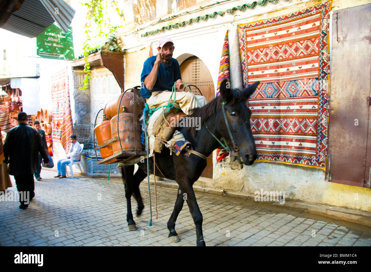 Fez Morocco Moroccan man on donkey in the old medina Stock Photo - Alamy