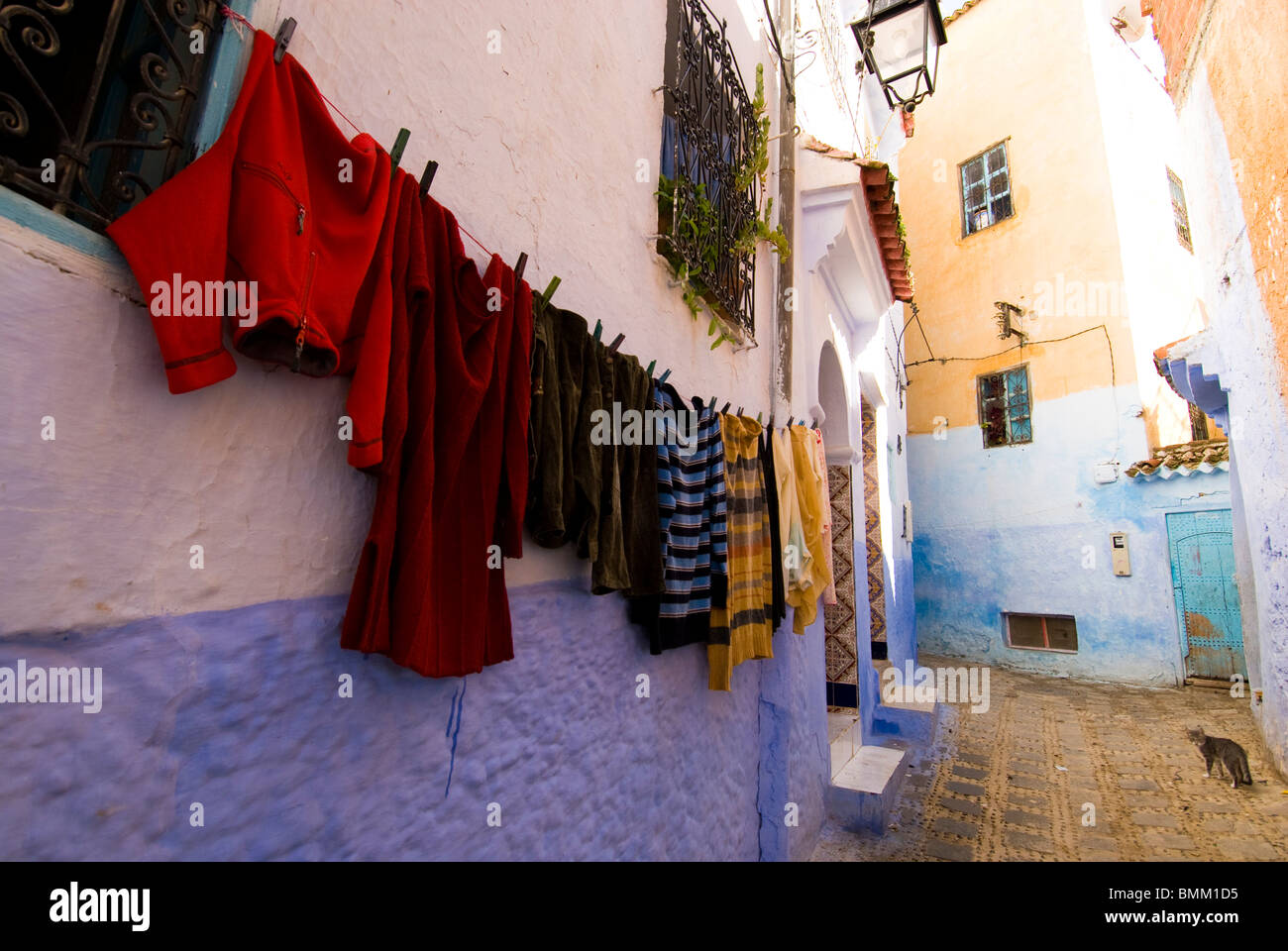 Chefchaouen Morocco laundry hanging on a wall in the medina Stock Photo ...