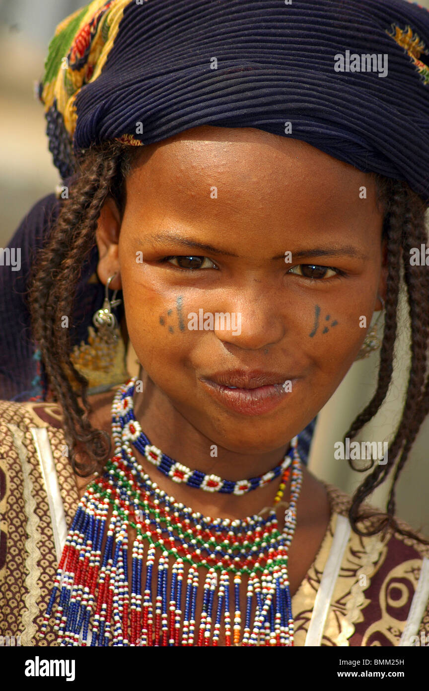 Niger, Niamey, African girl in traditionnal clothes and a black coif ...