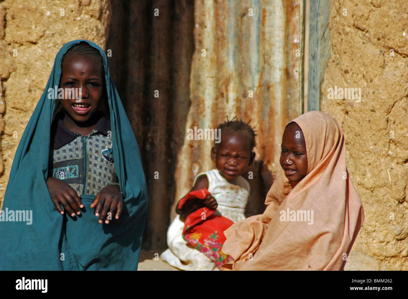 Niger, Niamey, African girls in colorful traditional muslim clothes ...