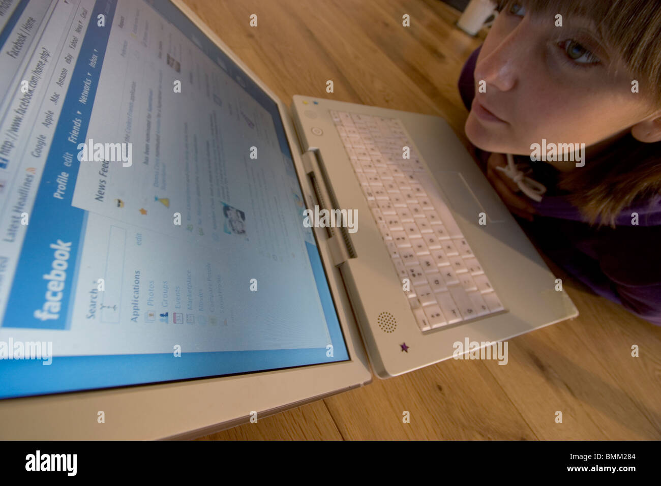 Close-up of a web surfer browsing the Facebook social networking ...