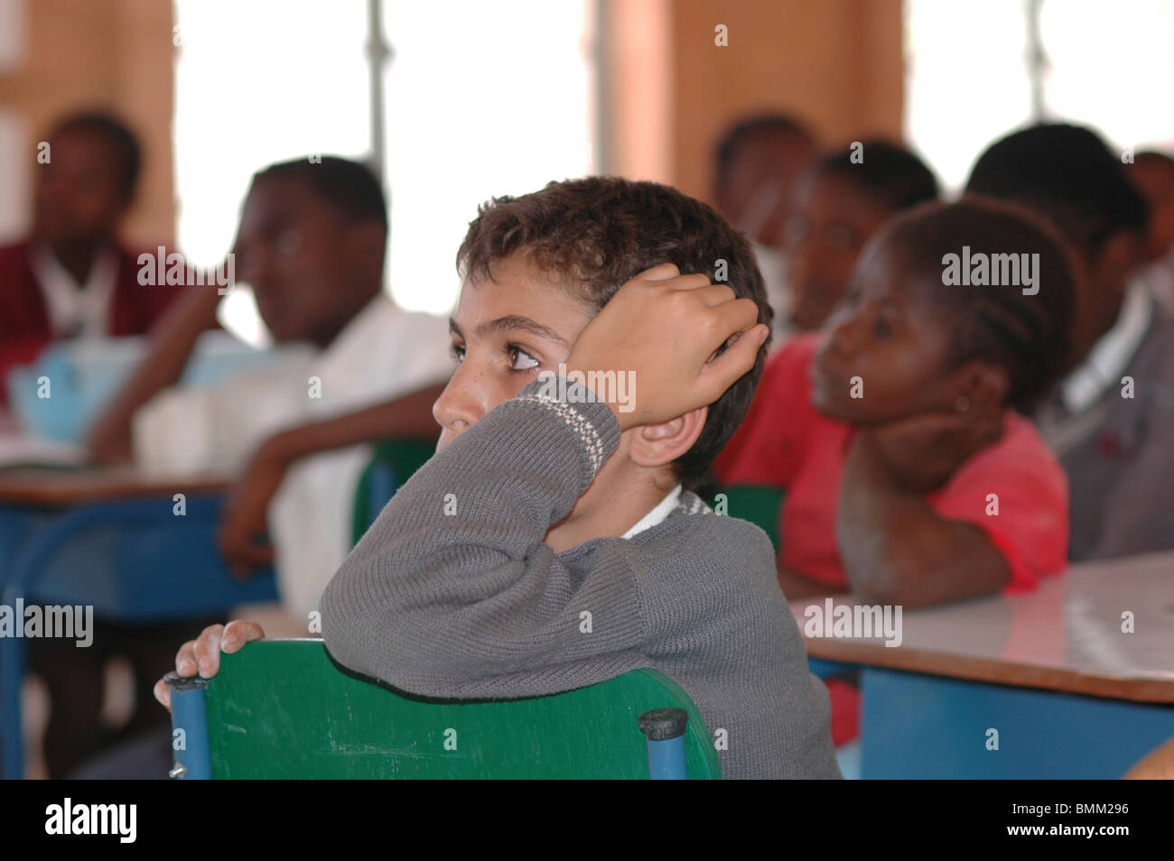 Pupils in the classroom, looking in front of them Stock Photo - Alamy
