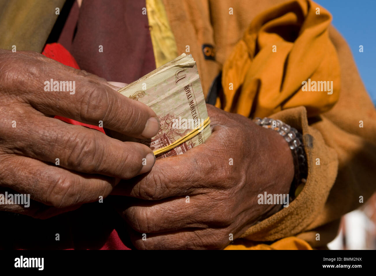 Monk money hi-res stock photography and images - Alamy