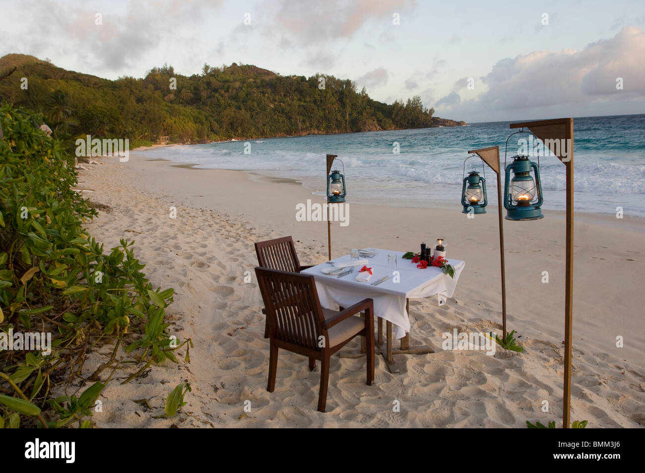 Private dinner on the beach at Banyan Tree Resort on Mahe Island Stock ...