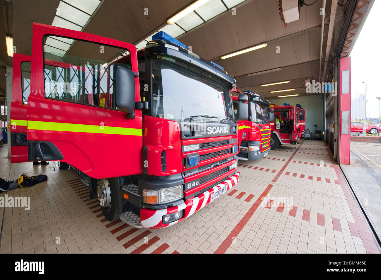 Fire Engines on Fire Station in Engine House Stock Photo - Alamy