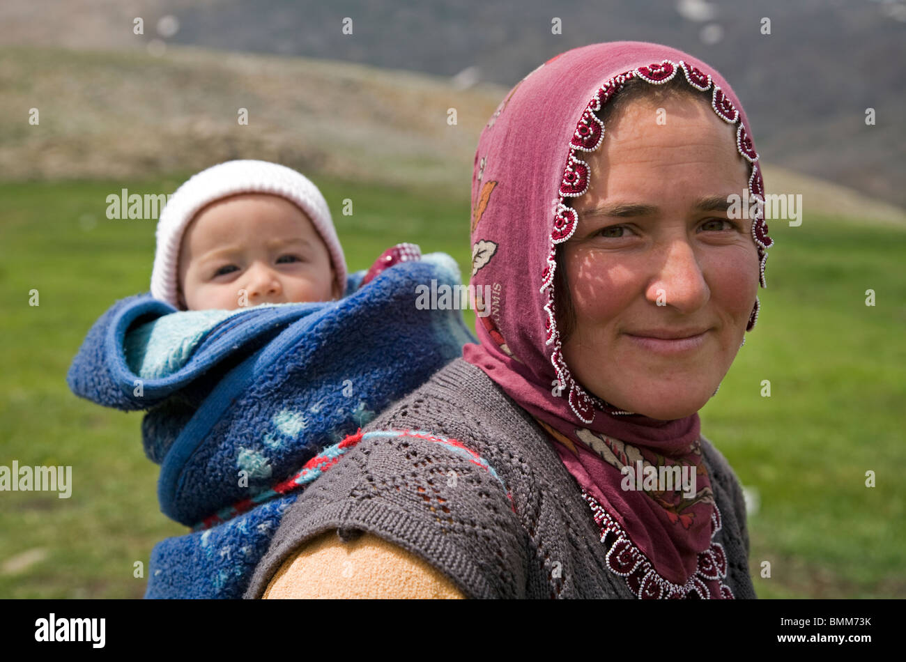 Nomadic shepherd woman with infant in Taurus Mountains Mersin Turkey ...