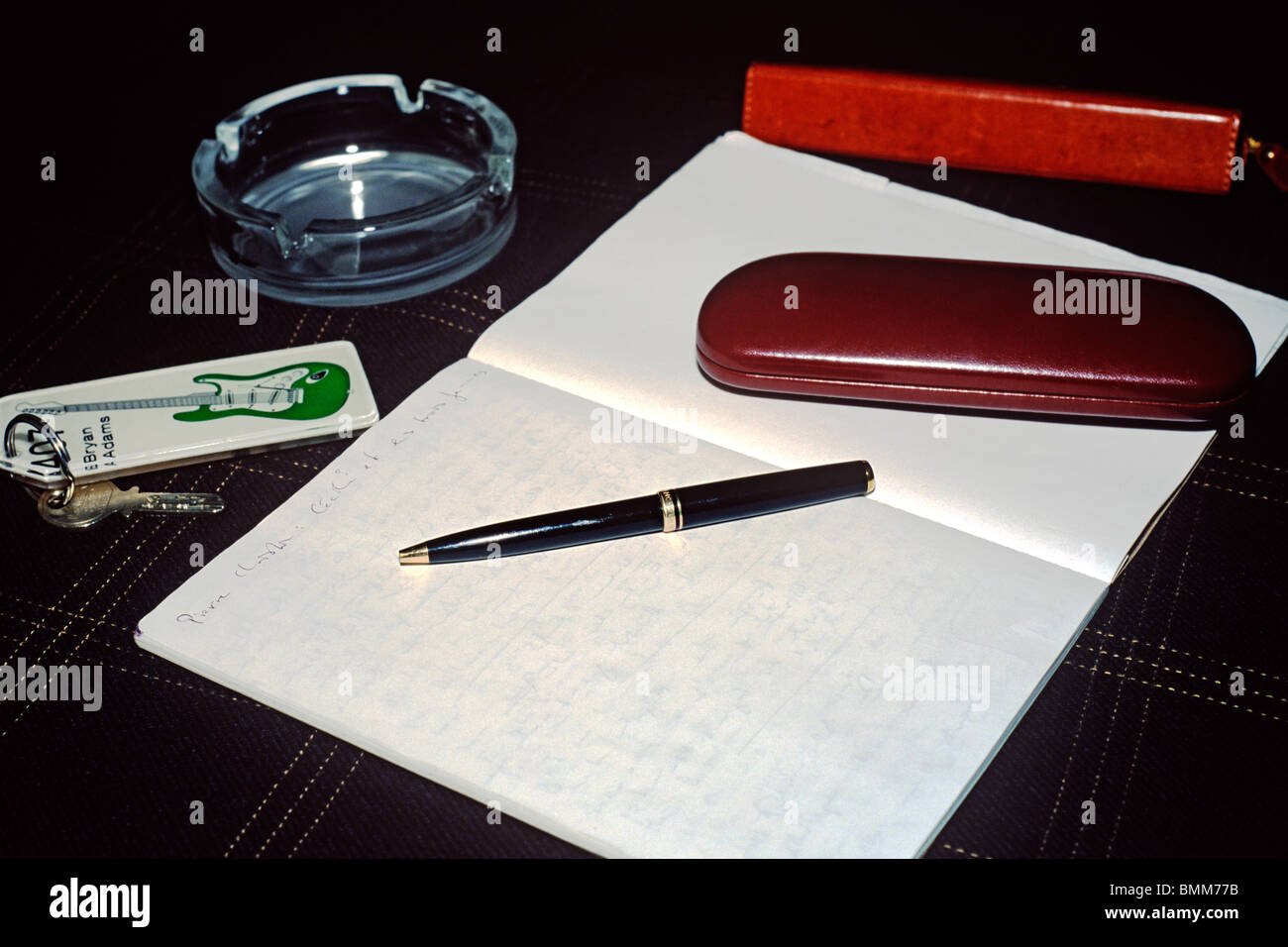 Hotel scene (notebook and pen Stock Photo - Alamy