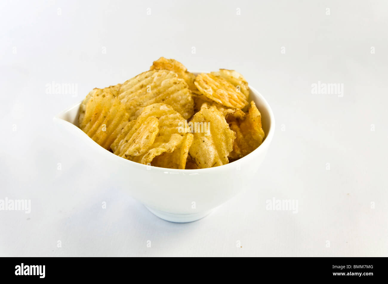 Potato chips junk food Stock Photo - Alamy