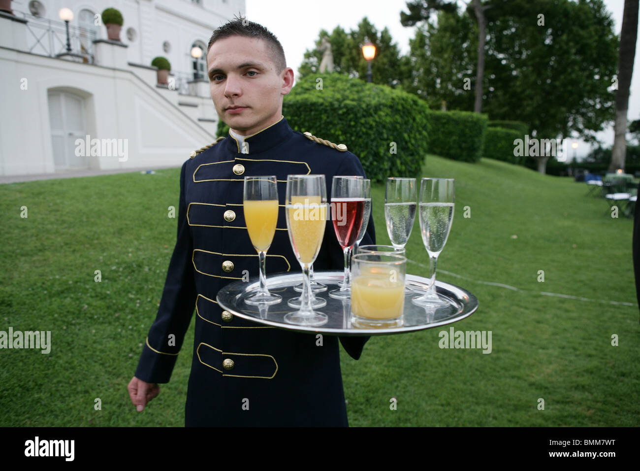 waiter in uniform with tray of glasses Rome Italy hotel Stock Photo - Alamy