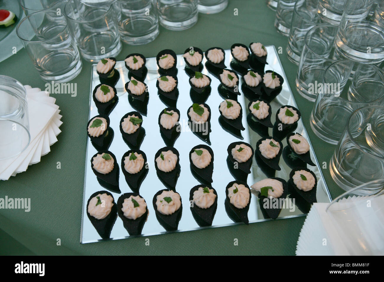 finger food showed in a mirror plate as appetizer, Italian food Stock ...