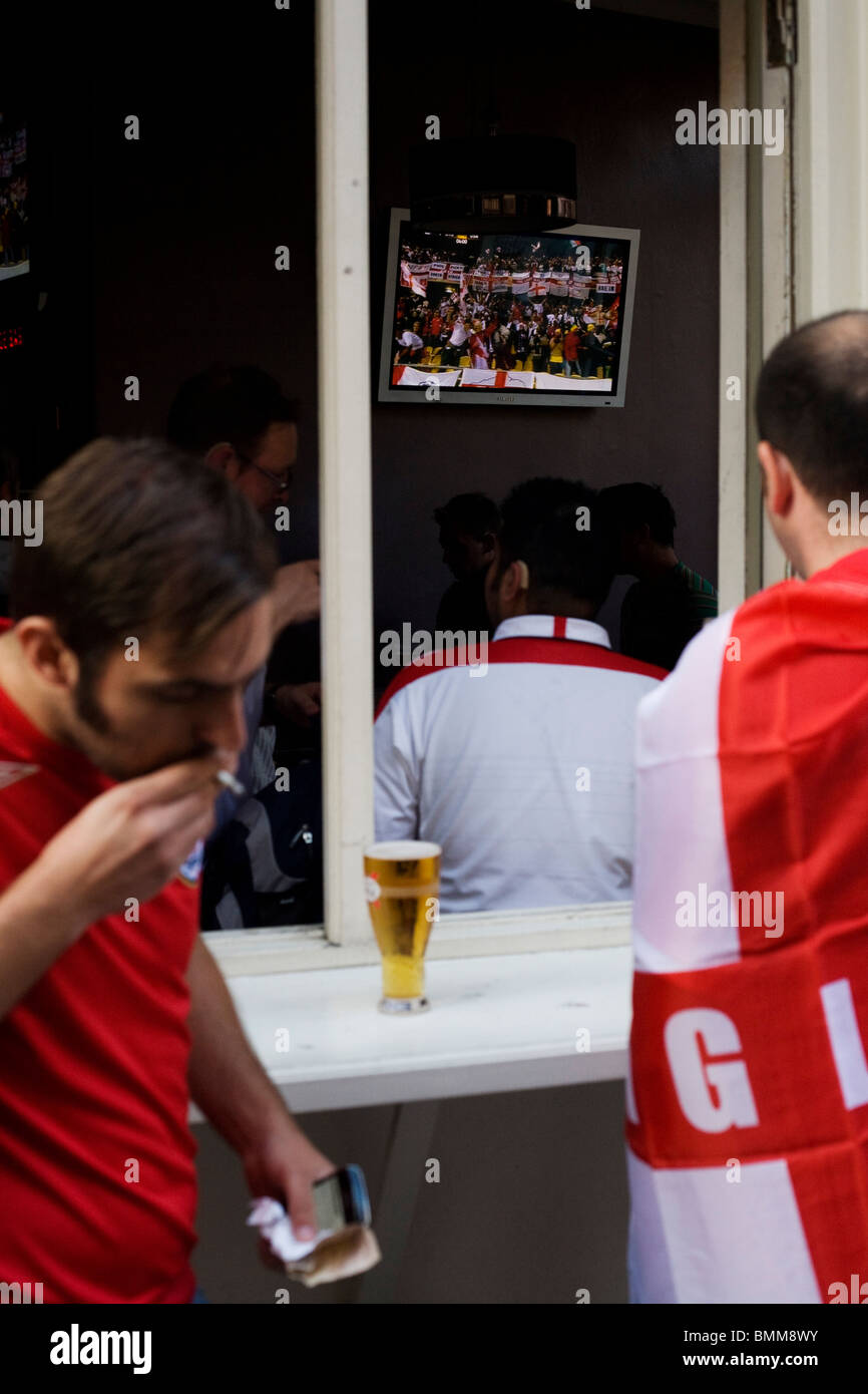 England World Cup football fans watch their team's opening match on TV ...