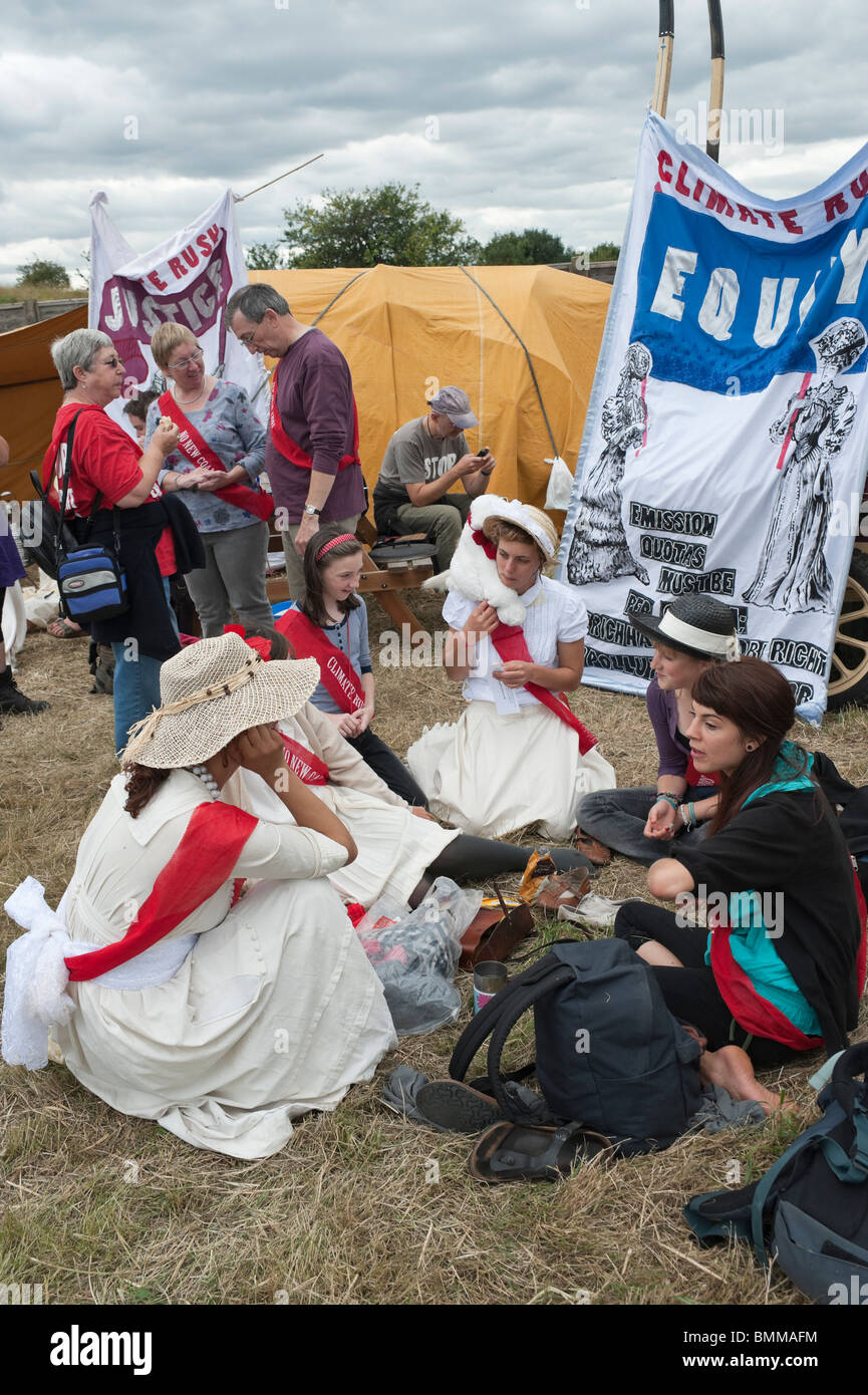 Climate Rush: Celebration of Community Resistance, Sipson. A group sits ...