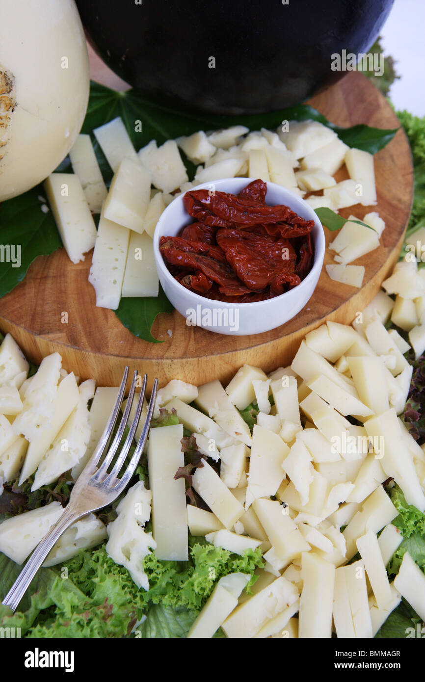 cheese dishes on table Stock Photo - Alamy