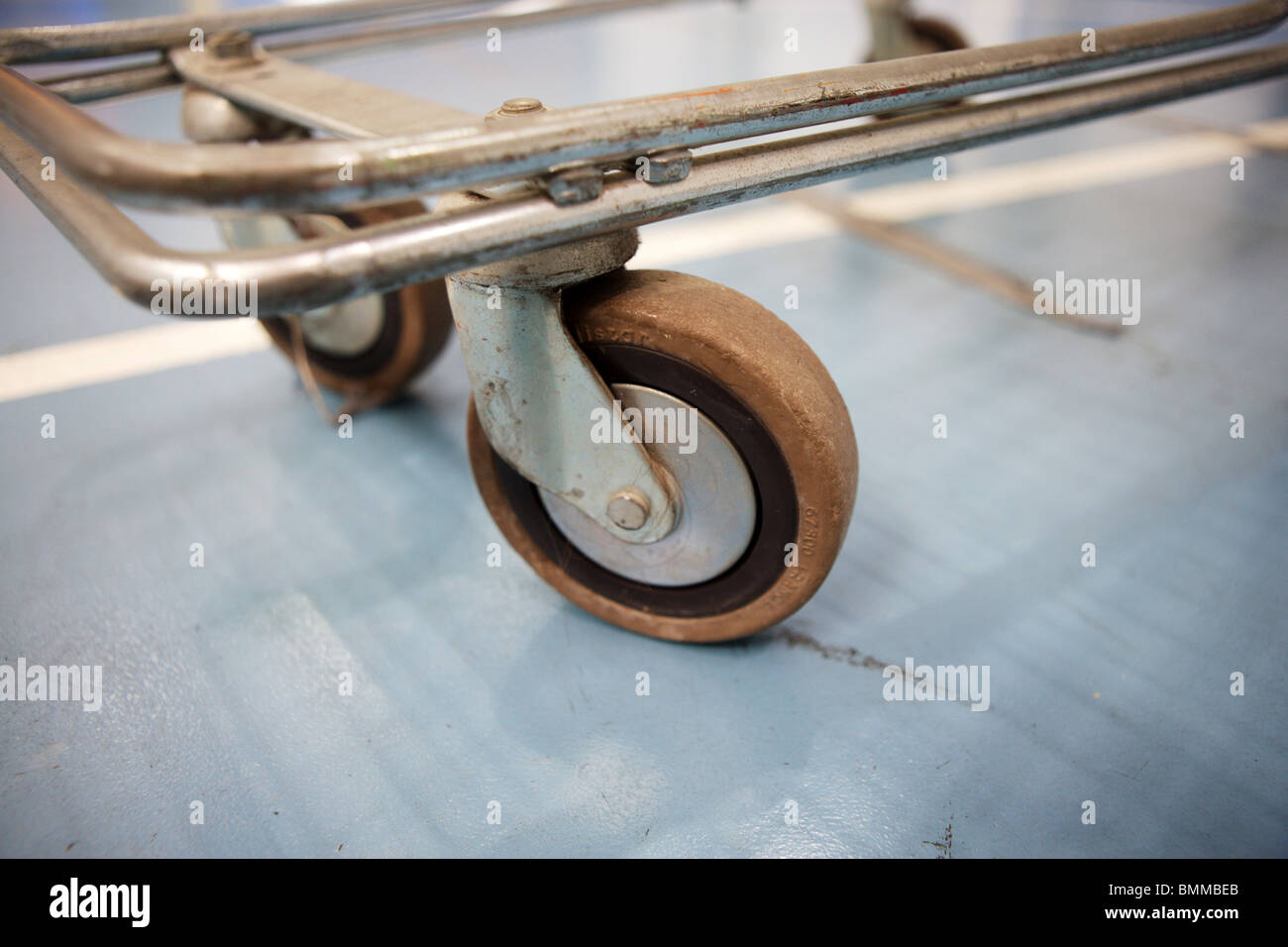 shopping cart wheel detail Stock Photo - Alamy