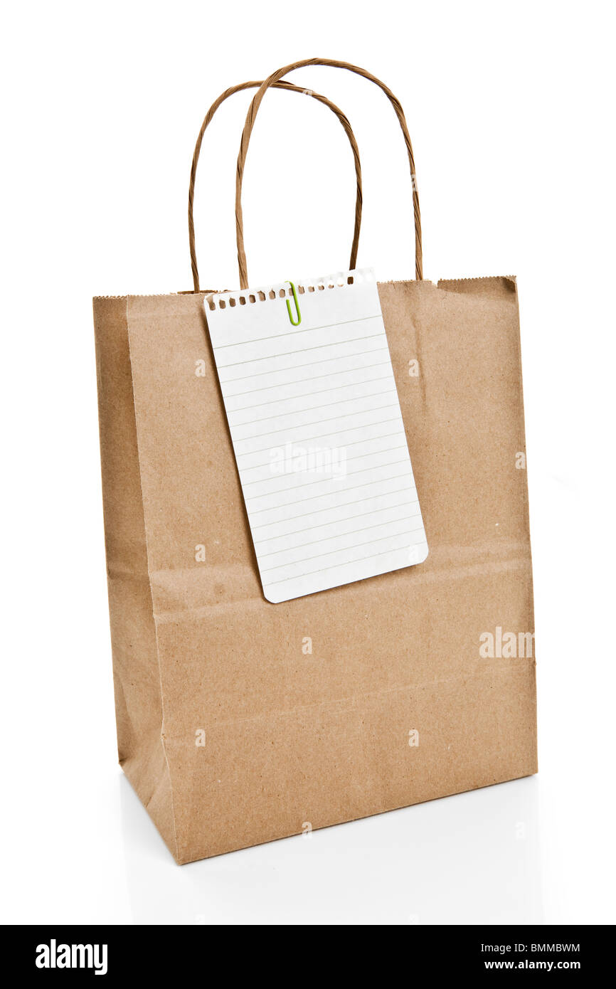 Brown paper shopping bag and note paper Stock Photo - Alamy