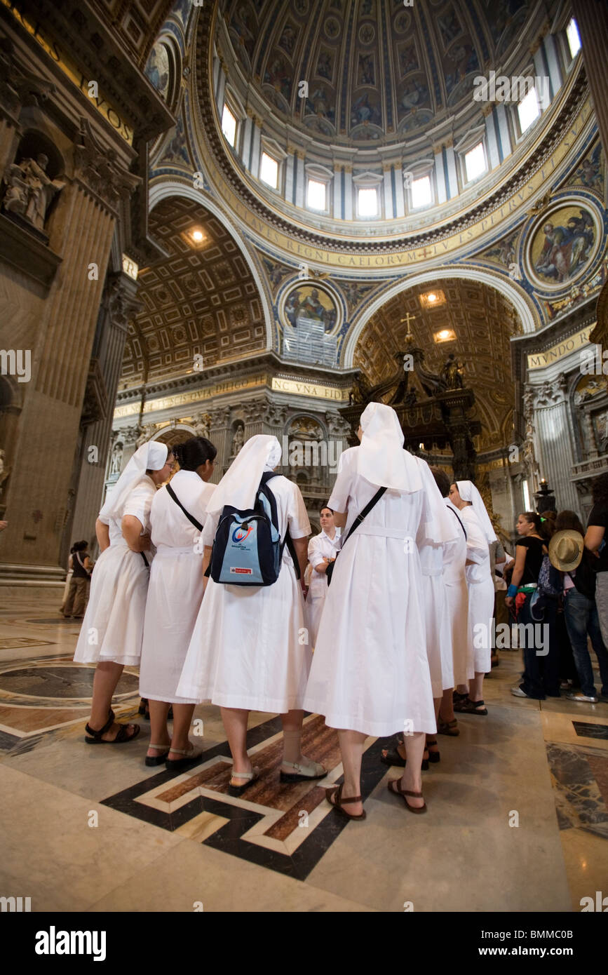 A group of Nuns visiting the St Peter's Basilica or Basilica di San ...
