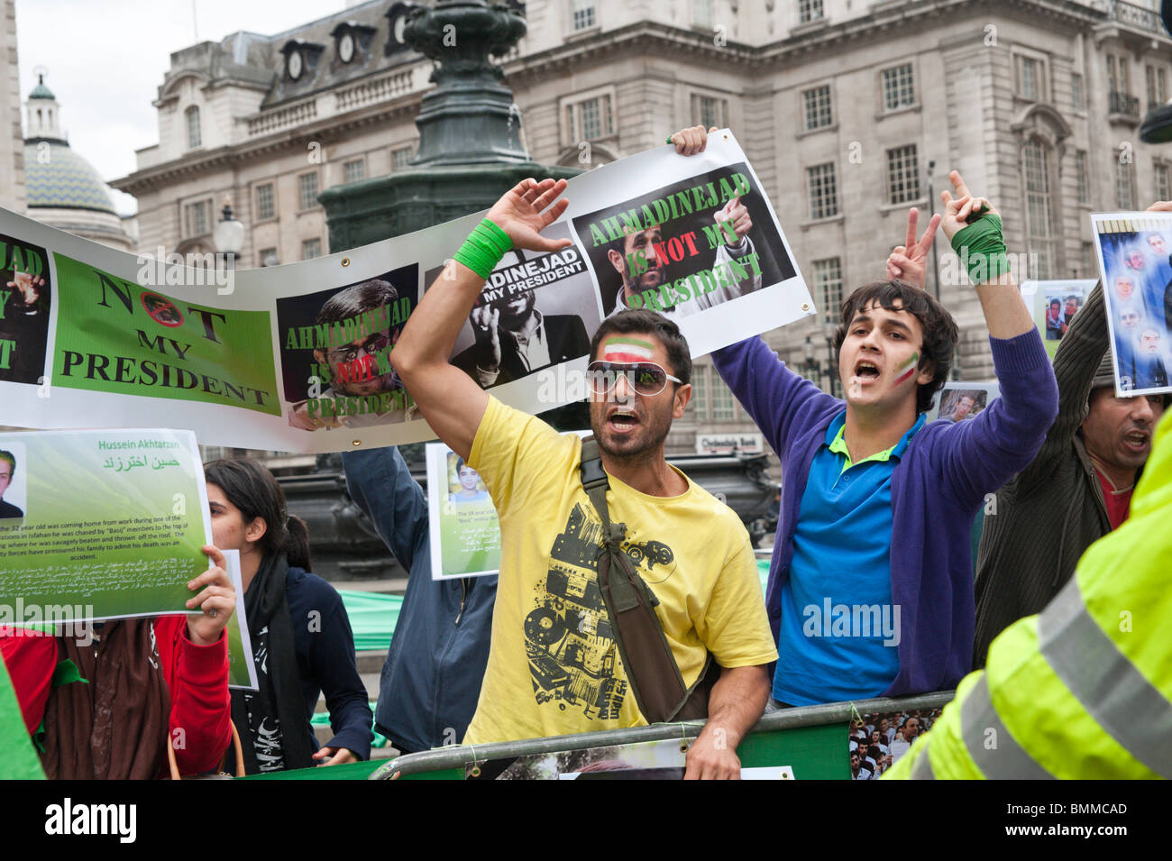 Iranian Green opposition hold up posters in protest during Al Quds Day ...