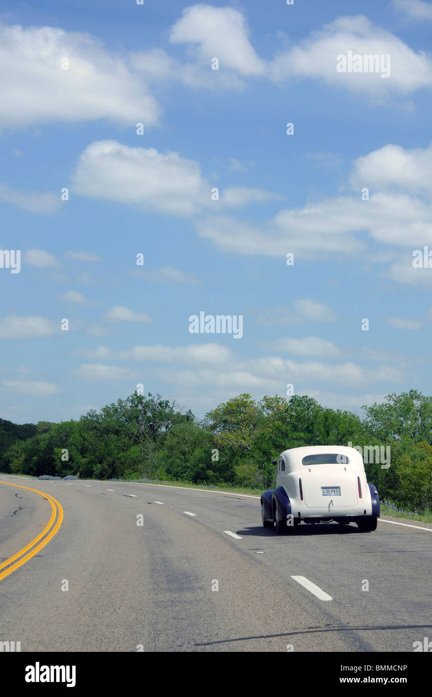 Old car on a road in Texas Hill Country, USA Stock Photo - Alamy