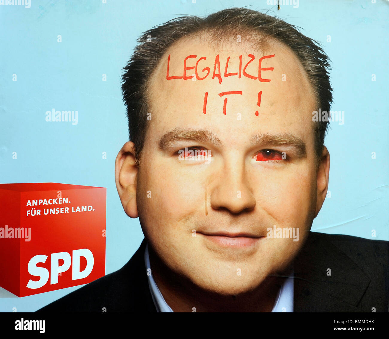 politician campaign poster defaced legalize it Stock Photo - Alamy