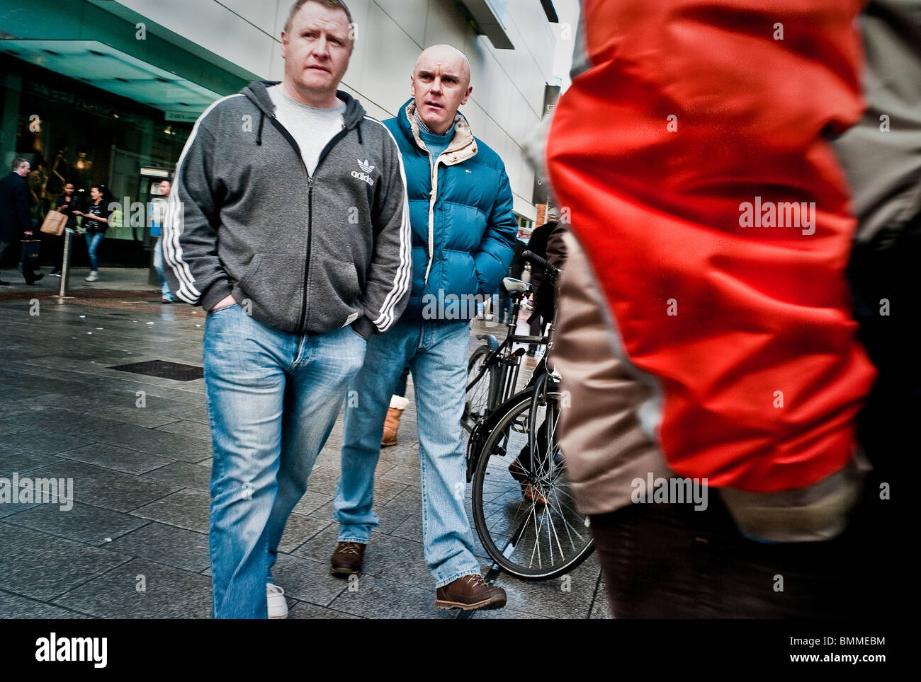 Two men walking down Henry street in Dublin Ireland Stock Photo - Alamy