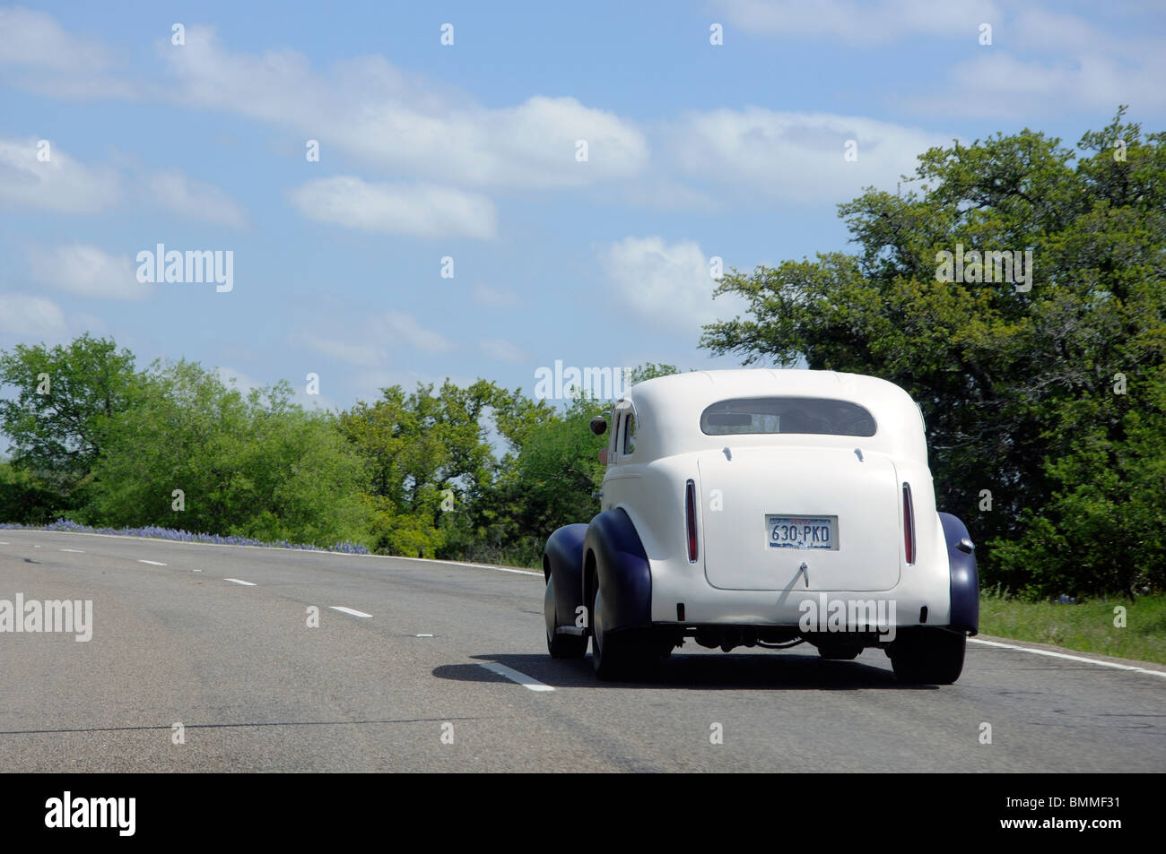 Old car on a road in Texas Hill Country, USA Stock Photo - Alamy