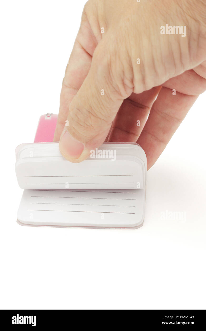 Hand opening note pad on white background Stock Photo - Alamy Hand opening note pad on white background Stock Photo - Alamy